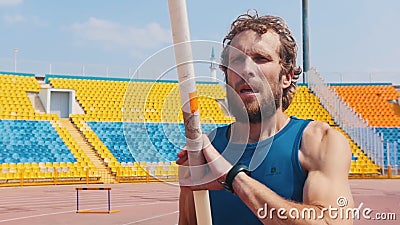 Pole Vault - a Bearded Athletic Man Holding a Pole and Getting Ready ...