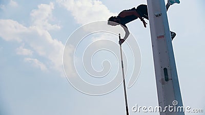 Pole Vault Training on the Stadium Outside- an Athletic Man Jumping ...