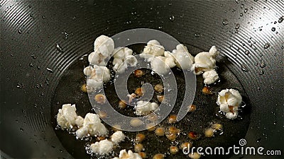 Popcorn popping in hot oil stock video. Video of bursting - 62328709