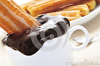 Porras, Thick Churros Typical Of Spain, Dipped In Hot Chocolate Stock ...