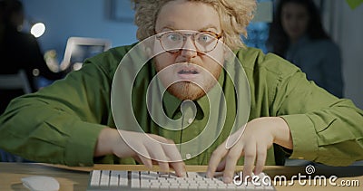 Portrait of Comic Guy Working with Computer Typing in Rush Looking at ...