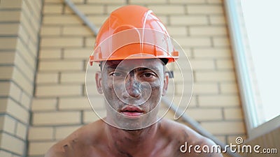Portrait of a Dirty Construction Worker in Hard Hat. Tired Builder ...
