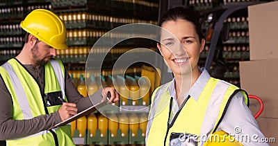 Portrait of Female Supervisor Smiling in Warehouse Stock Footage ...