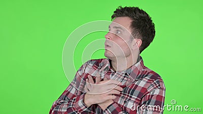 Portrait of Young Man Feeling Scared, Frightened, Green Chroma Screen ...