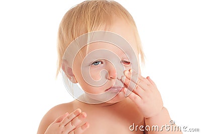 Portrait Of Tired Young Sitting Baby Touching Eyes Royalty Free Stock ...