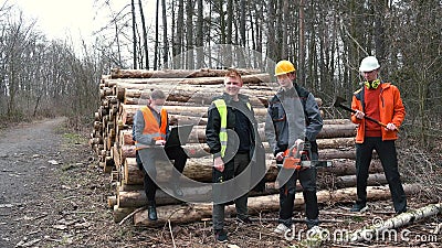 Portrait of Workers at Logging. the Team is Posing. the Worker Uses a ...