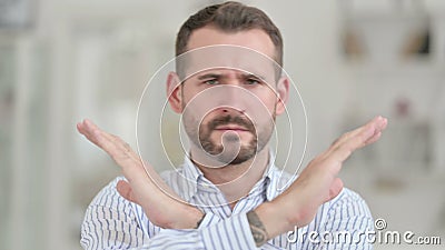 Portrait of Young Man Saying No with Arm Gesture Stock Video - Video of ...