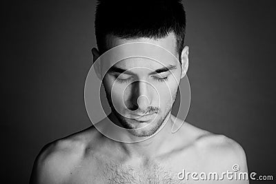 Portrait Of Young Man Looking Down Stock Photography - Image: 22284442