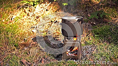 Pot Boiling on Wood Burning Twig Stove Stock Footage - Video of flame ...