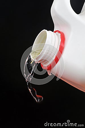 Pouring Bleach Close Up On Black Background Royalty-Free Stock Photo ...