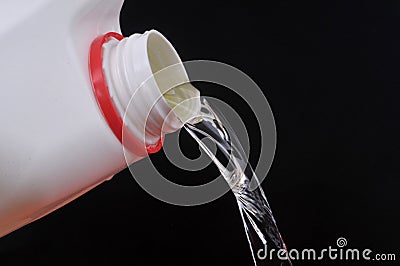 Pouring Bleach Close Up On Black Background Royalty-Free Stock Image ...