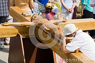Praying Woman At Large Wooden Crucifix Editorial Image - Image: 6439240