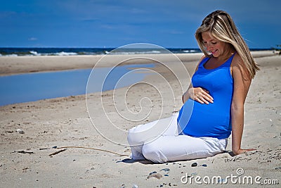 Pregnant woman at beach stock photo. Image of blue, love - 21305286