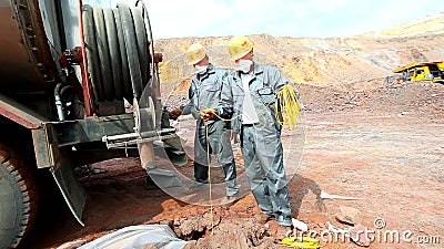 Explosives Work in a Quarry. the Process of Placing Explosives in an ...