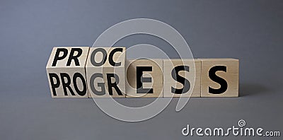 Process And Progress Symbol. Turned Wooden Cubes With Words Process And ...
