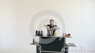 Professional Bartender Man Juggling Bottles and Shaking Cocktail at ...
