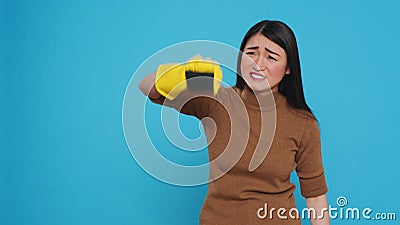 Professional Cleaner Doing Intense Cleaning Using Sponge while Ensuring ...