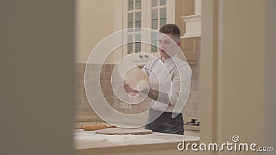 Professional Cook Spinning and Throwing Pizza Dough Up in the Air with ...