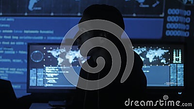 Young Geek Hacker Programmer is Working on Computer in Cyber Security ...