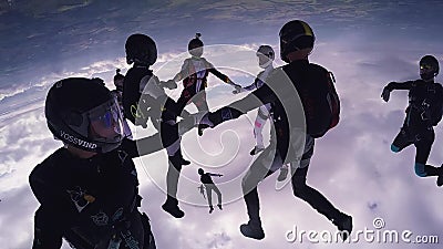 Professional Skydivers Make Formation in Cloudy Sky. Extreme. Flight ...