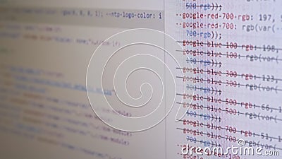 Programmer Views the HTML Code of the Page on a Screen of a Computer ...