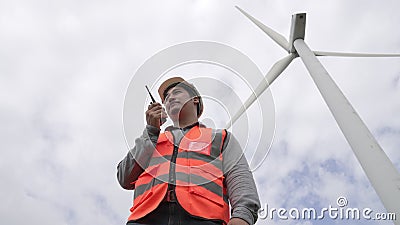 Progressive Engineer Working with the Wind Turbine, with the Sky As ...