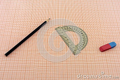 Protractor, Pencil And Eraser Lying On A Sheet Of Graph Paper Royalty ...