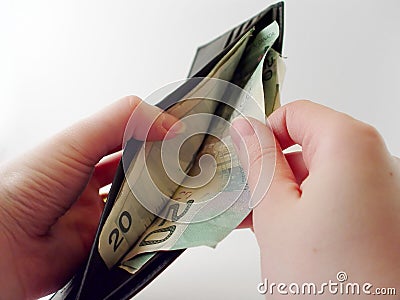 Pulling Money Out Of Wallet Royalty Free Stock Images - Image: 80539