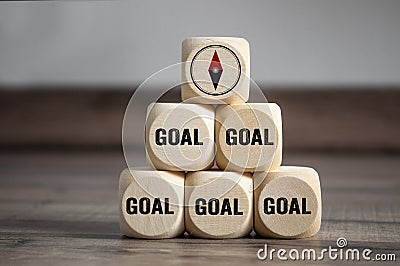 Pyramide Made Of Cube And Dice With Words Goal And Compass Icon On ...