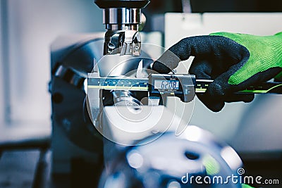 Quality Control Manufacturing.Hands Of An Engineer Measures A Metal ...