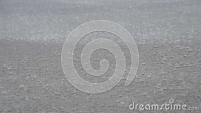 Rain on a concrete slab stock video. Video of closeup - 83630435