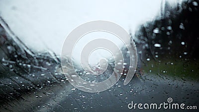Rain Drops Splatters on Windshield during Rain Storm, Difficult Driving ...