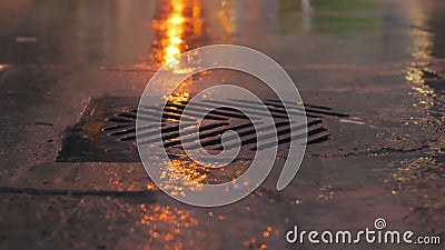 Rain Falling in Slow Motion Down a Sewer Drain at Night. Stock Video ...