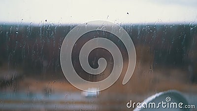 Rain Outside the Window. Raindrops Flow Down the Glass Stock Footage ...