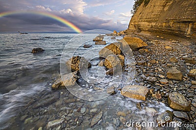 Rainbow Over The Cliff After Passing An Evening Storm Stock Photography ...