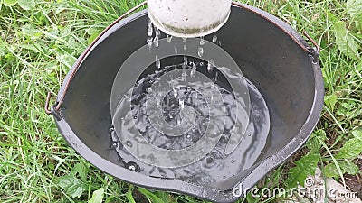 Rainwater Dripping from a Drain into a Bucket Stock Footage - Video of ...