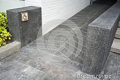 Ramped Access, Using Wheelchair Ramp With Information Sign On Wall ...