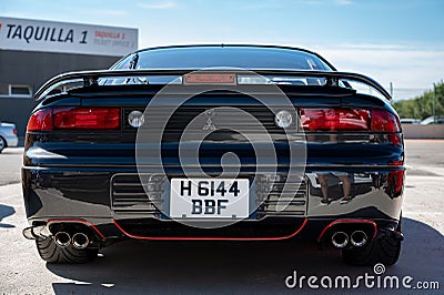 Rear View Of A Black Mitsubishi 3000Gt Parked On The Street Editorial ...