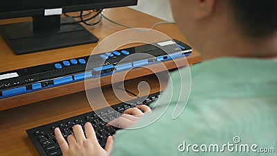 Rear View of Blind Person Woman Using Computer Keyboard and Braille ...