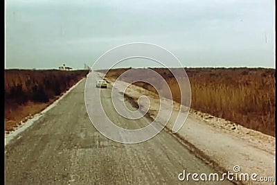 Rear View of Car Driving Down Back Road in the Middle of Nowhere Stock ...