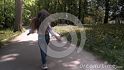 Rear View of Child Walking Along the Path in the Park Stock Footage ...