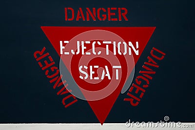 Red Ejector Seat Warning Sign On Jet Fighter Aeroplane Fuselage. Danger ...