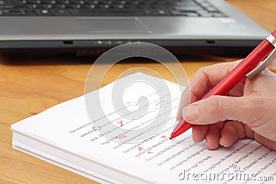 Red Pen Proofreading A Manuscript By Laptop Royalty-Free Stock ...