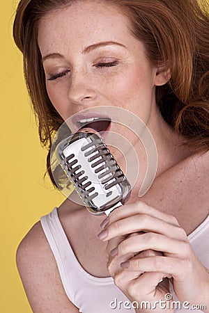 Redhead female singer. - Stock Image - Everypixel