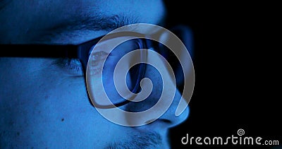 Reflection of the Screen in the Man`s Glasses in the Dark. Stock Video ...