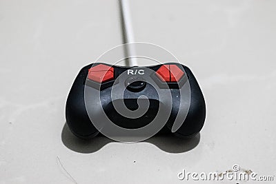 The Remote Controller Used To Control The Toy Car Is Located On The ...