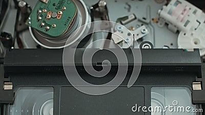 Rewind a VHS Tape into a VCR Player Stock Footage - Video of equipment ...