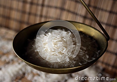 Rice On A Scale Royalty-Free Stock Photo | CartoonDealer.com #3831195