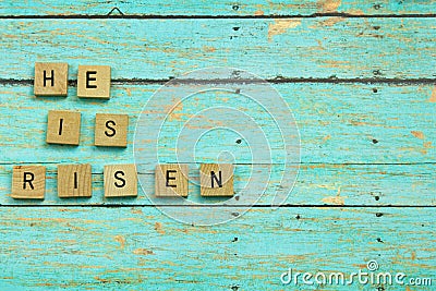 He Is Risen Christian Blocks On A Blue Wood Plank Background Royalty ...
