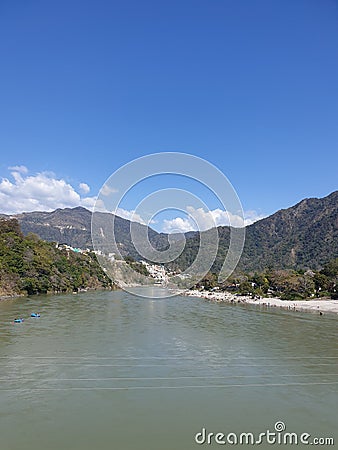 Rishikesh Seen From The Ganges River With Mountains In Background Stock ...